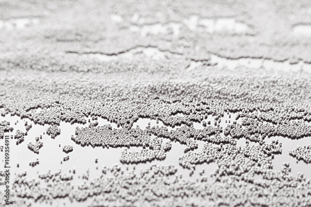 Abstract silver background with metal particles. The texture. Stock ...