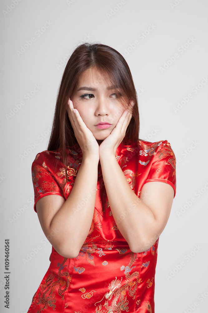 Sad Asian girl in chinese cheongsam dress Stock Photo | Adobe Stock