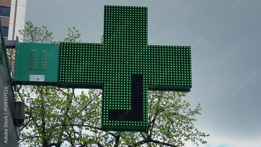 LED Pharmacy Cross Sign Animated Advertising. The green cross is ...