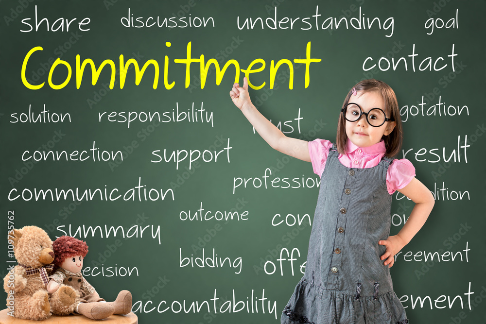 Cute little girl wearing business dress and showing commitment concept ...