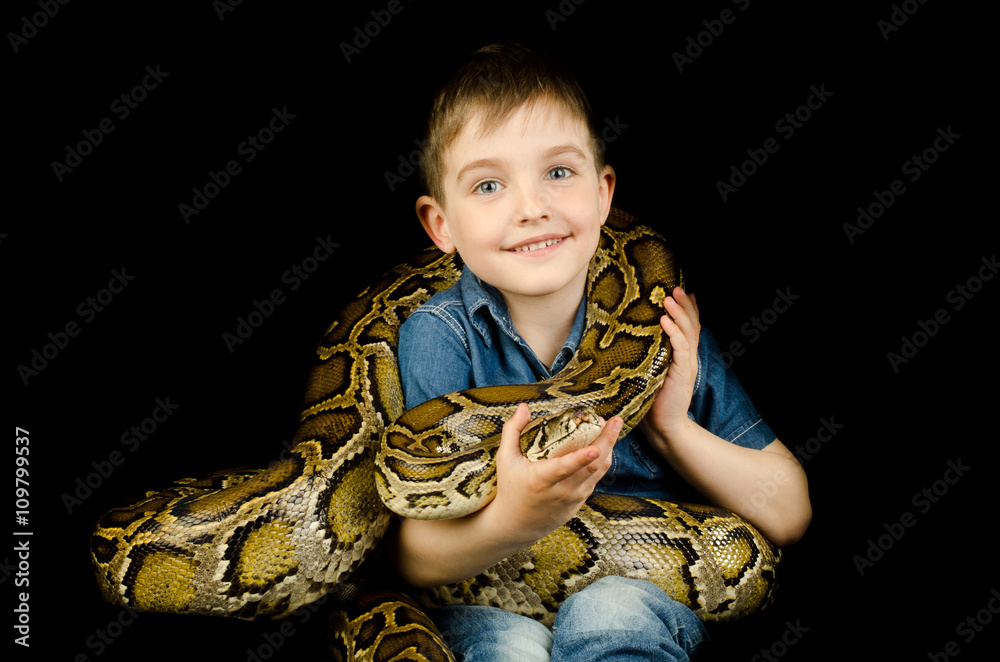happy kid and giant snake Stock Photo | Adobe Stock