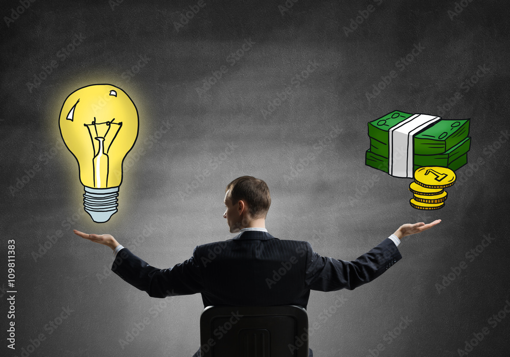 Businessman thinking over his investments foto de Stock | Adobe Stock