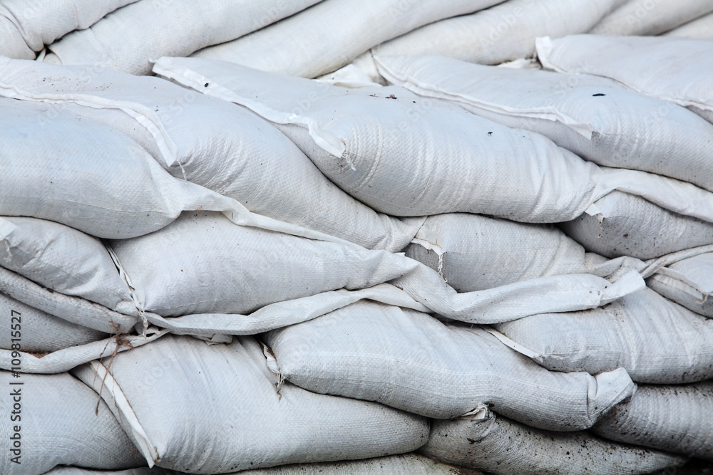 stack of sandbag Photos | Adobe Stock