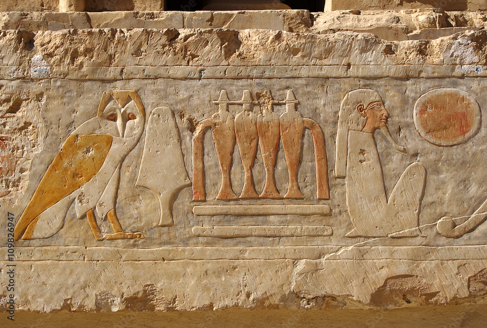 Luxor, ancient Egyptian reliefs depicting gods in the Hatsepsut Temple ...