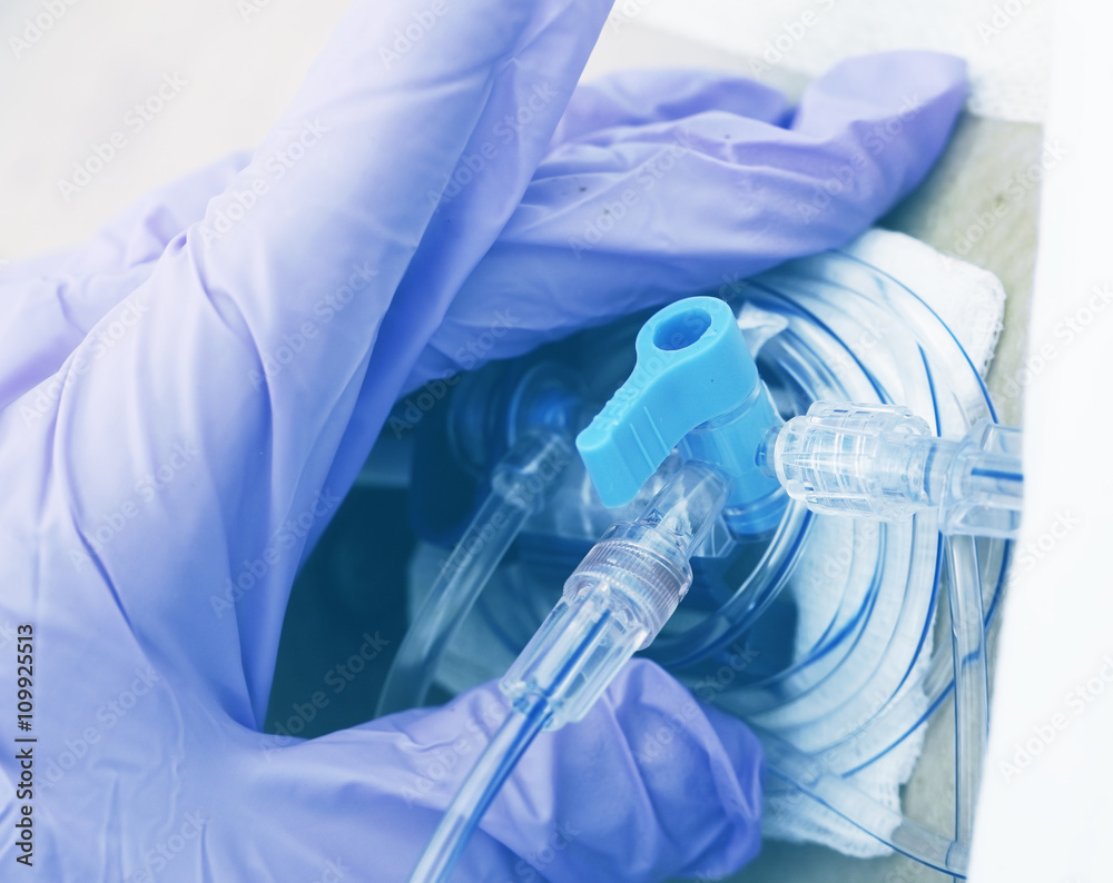 Nurse sets catheter to a patient Stock Photo | Adobe Stock