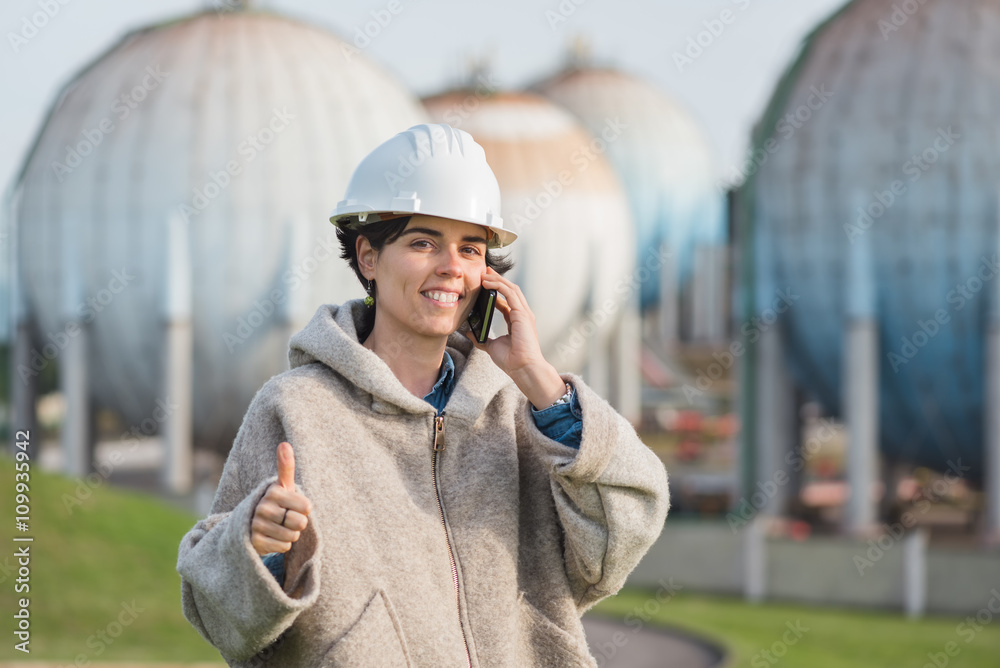 successful independent engineer smiling woman talking on the phone on ...