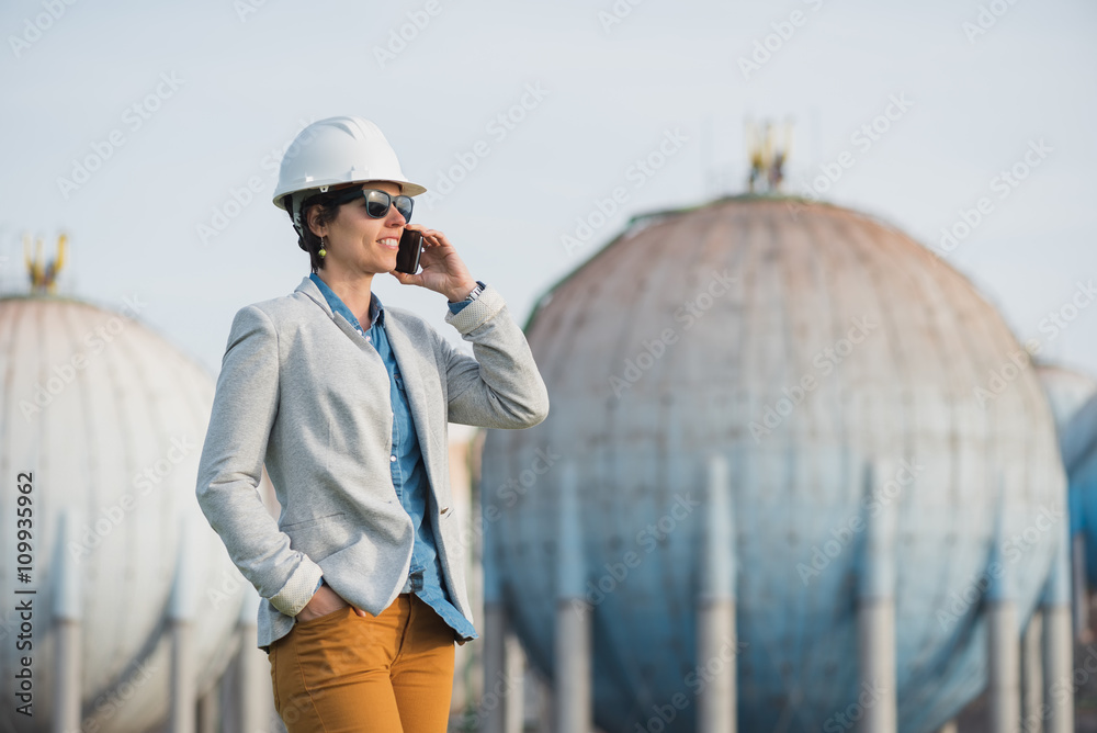 successful independent engineer smiling woman talking on the phone on ...