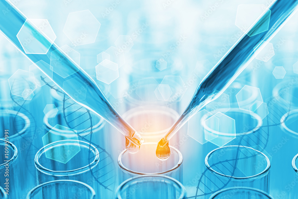 science pipette with a drop of substance over laboratory test tu Stock ...