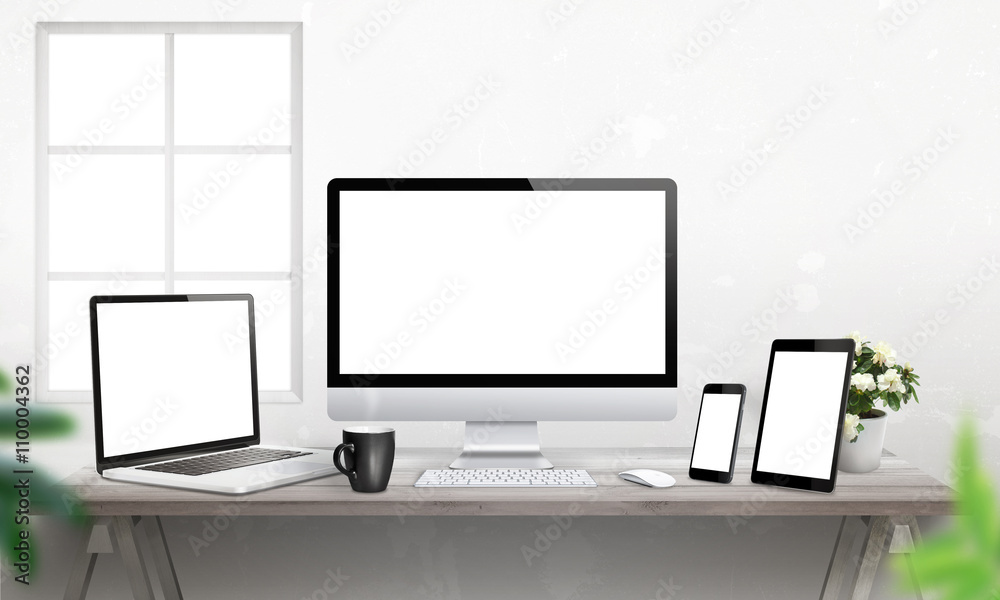 Responsive devices on desk with isolated screen for mockup. Computer ...