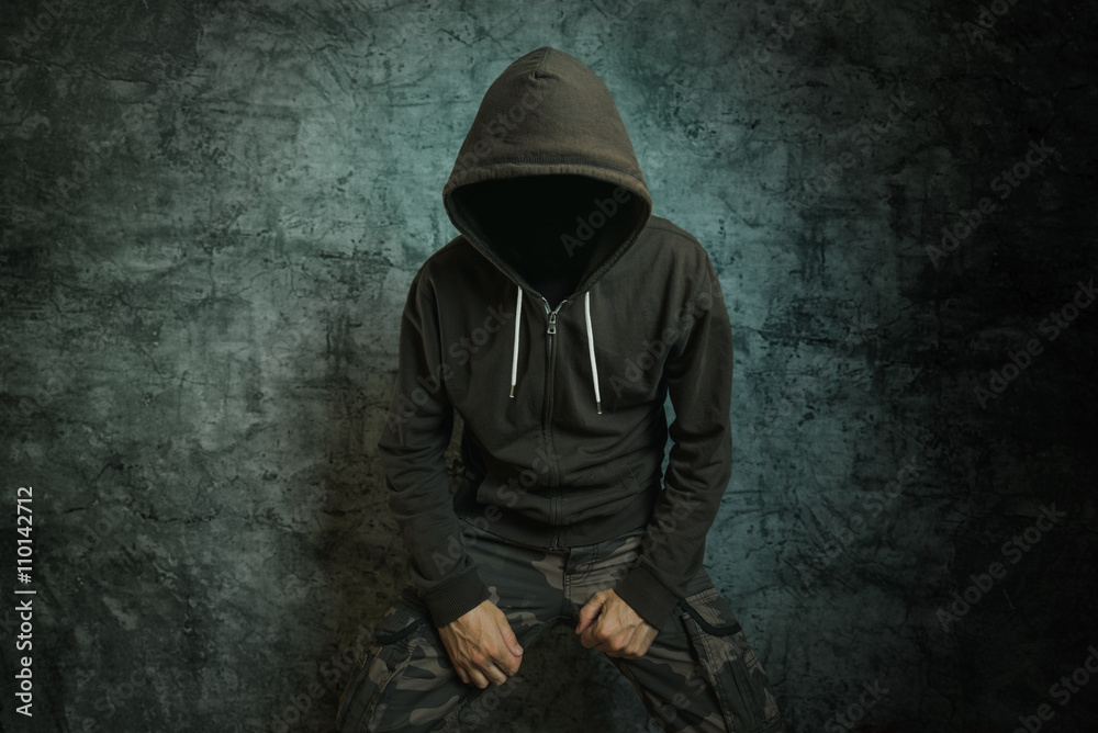 Spooky evil criminal person with hooded jacket Stock Photo | Adobe Stock