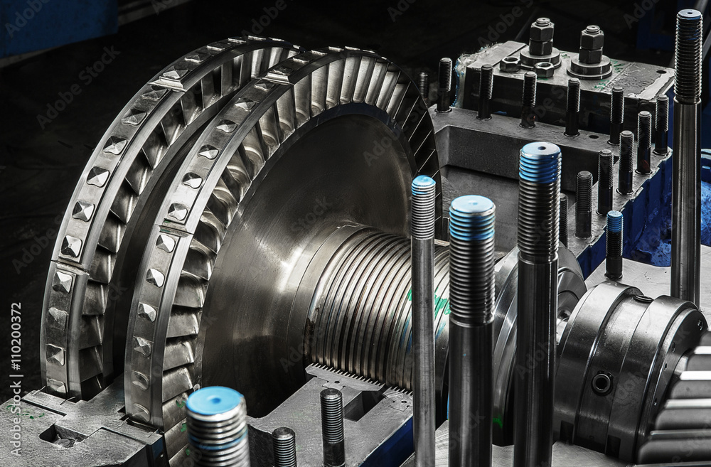 A wheel of a small steam turbine. Stock Photo | Adobe Stock