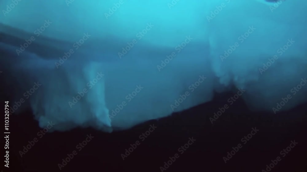Unique extreme underwater shooting scuba dive beneath ice at geographic ...