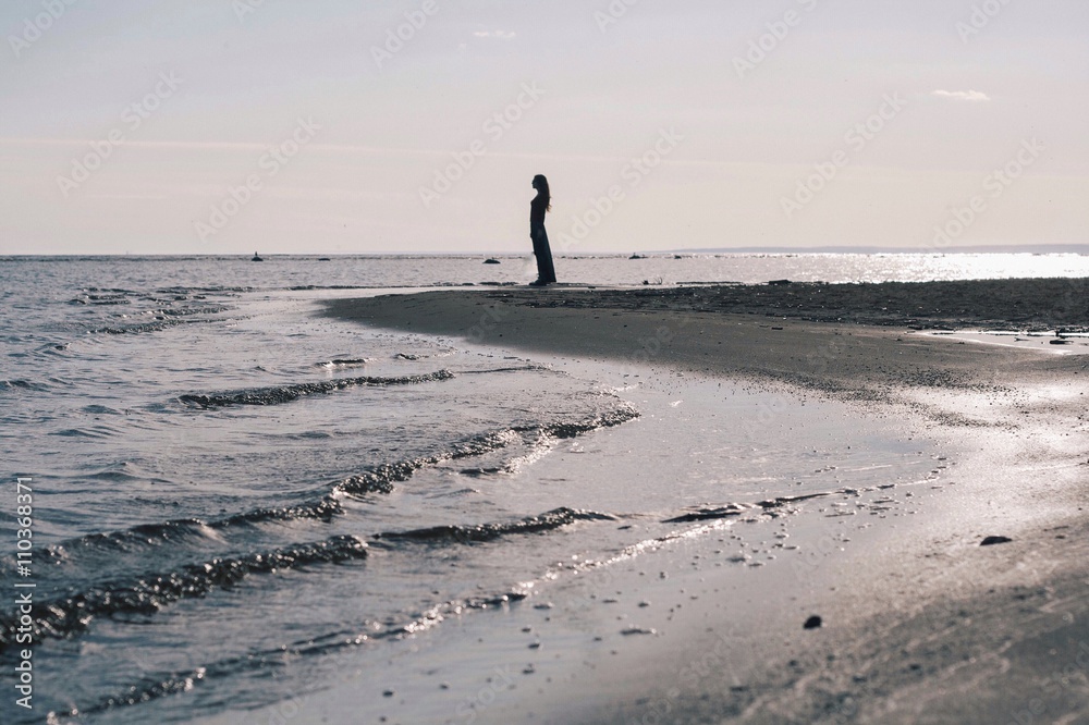 standing on the shore 스톡 사진 | Adobe Stock