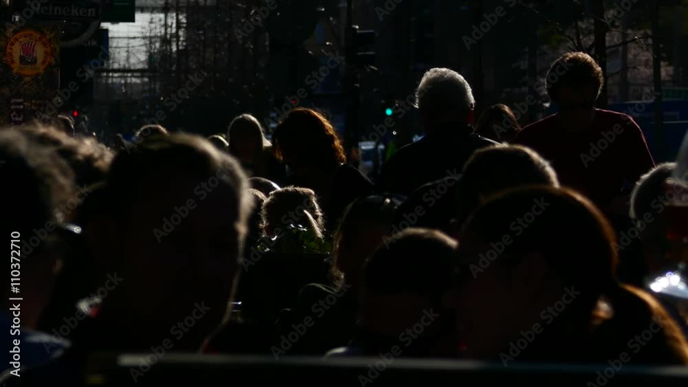 STOCKHOLM, SWEDEN, MAY 2016: Crowd of silhouette people sitting outdoor ...