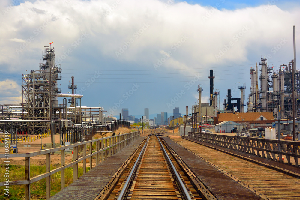 Oil and Gas Refinery Distillation Towers with Railroad Tracks and a ...