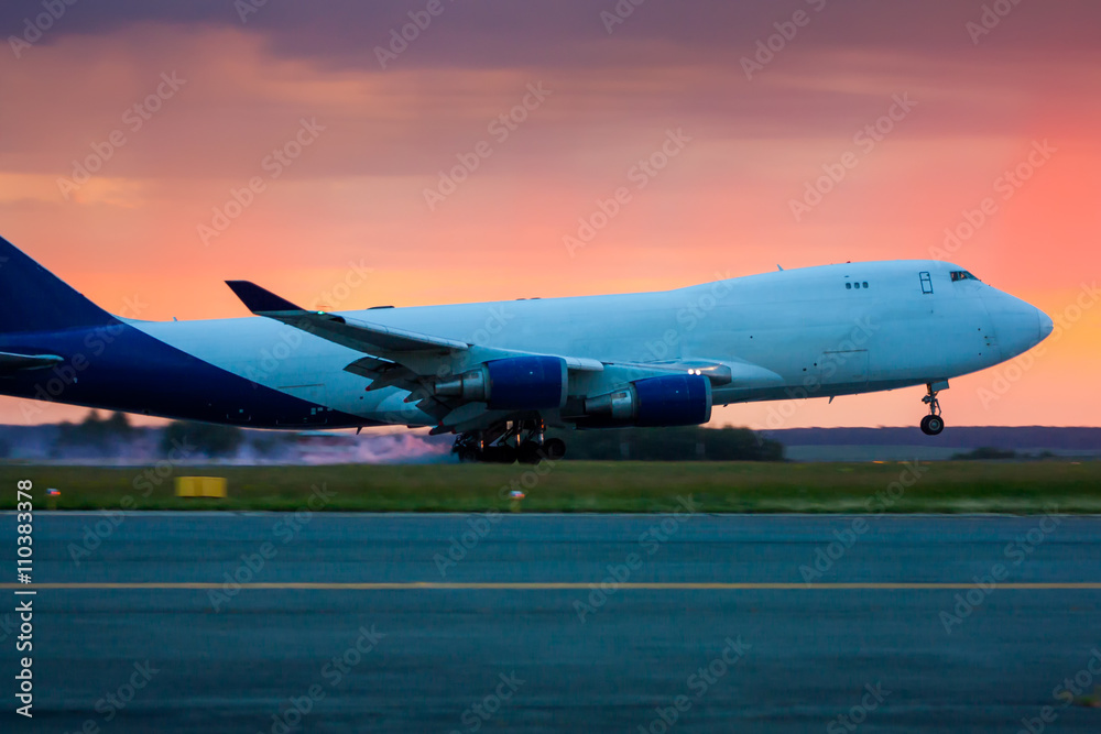 Landing widebody cargo aircraft early summer morning Stock Photo ...