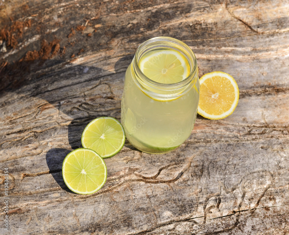 Fresh citrus lemonade in nature. Stock Photo | Adobe Stock
