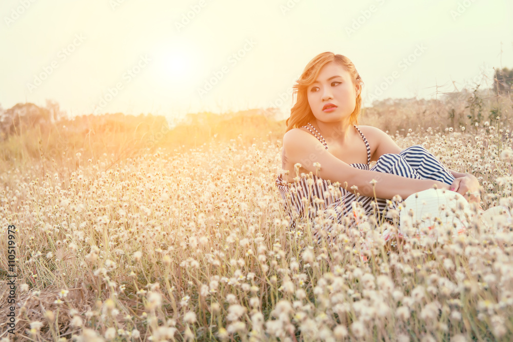Sad Girl In Field Of Flowers