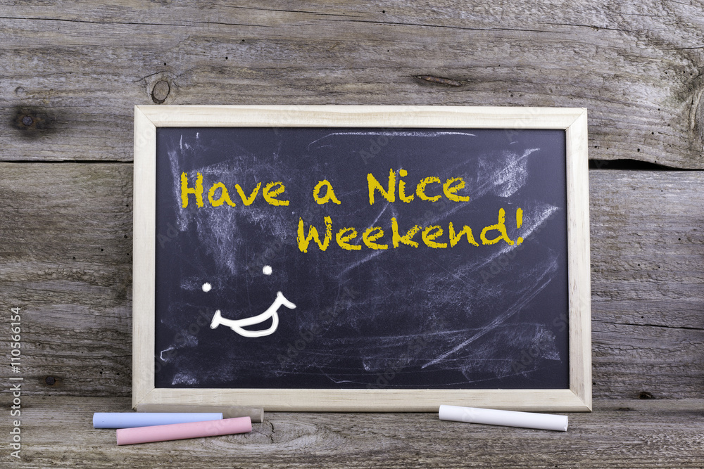 Have a Nice Weekend! Chalk board on a wooden table Stock-Foto | Adobe Stock