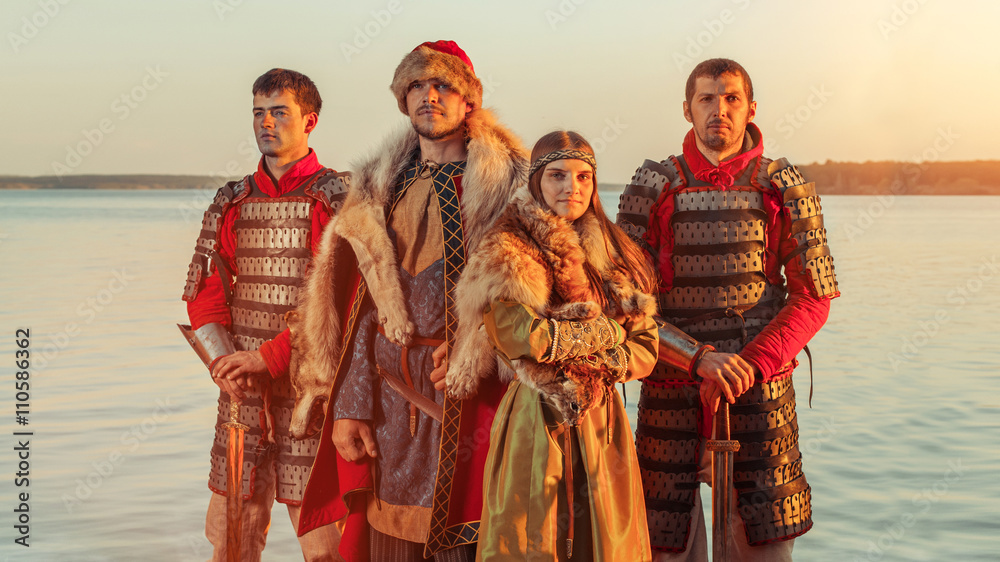 North prince with the princess and two warriors with swords on t Stock ...