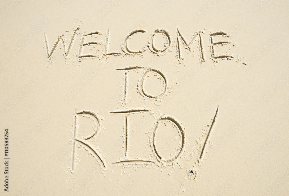 Welcome to Rio (as in, de Janeiro) message handwritten in smooth sand ...
