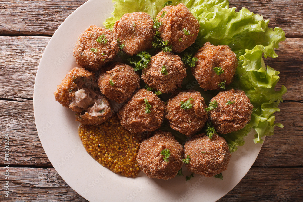 Dutch meat croquettes Bitterballen and mustard close up. horizontal top ...