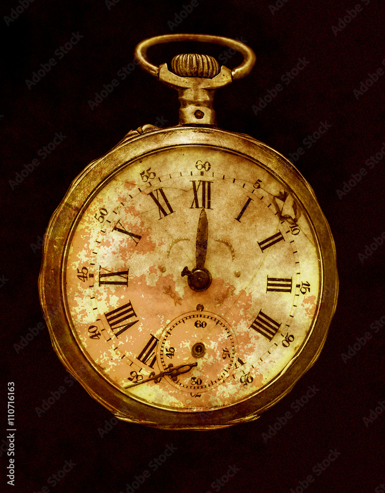 Antique silver broken pocket watch isolated on a pure black background ...