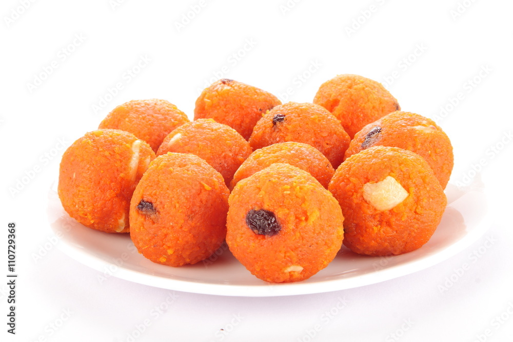Red Ladoo or bundi laddu in plate Stock Photo | Adobe Stock