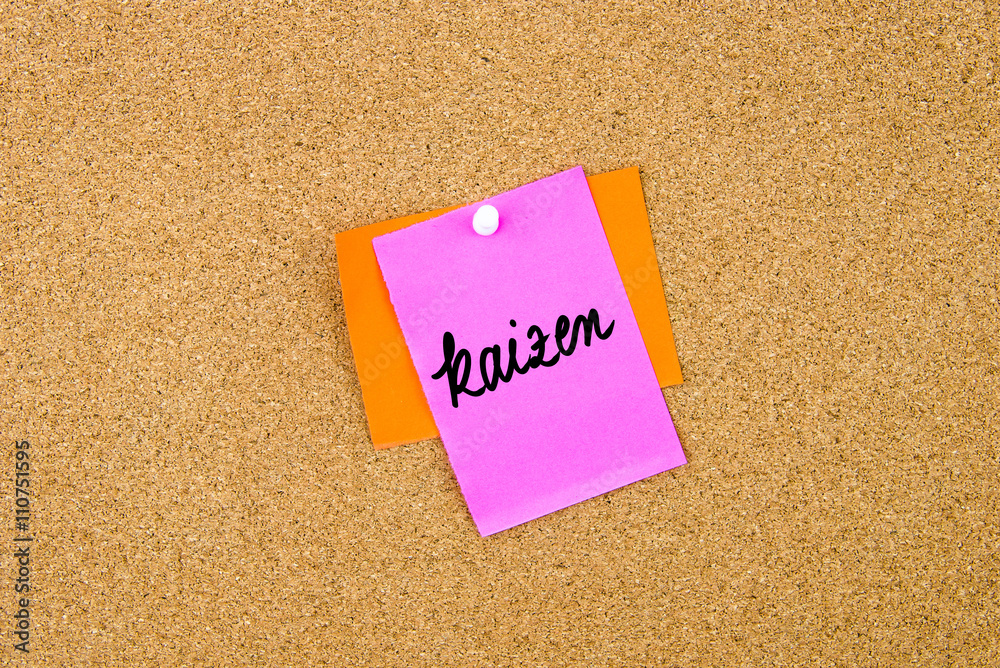 Kaizen written on paper note Stock Photo | Adobe Stock