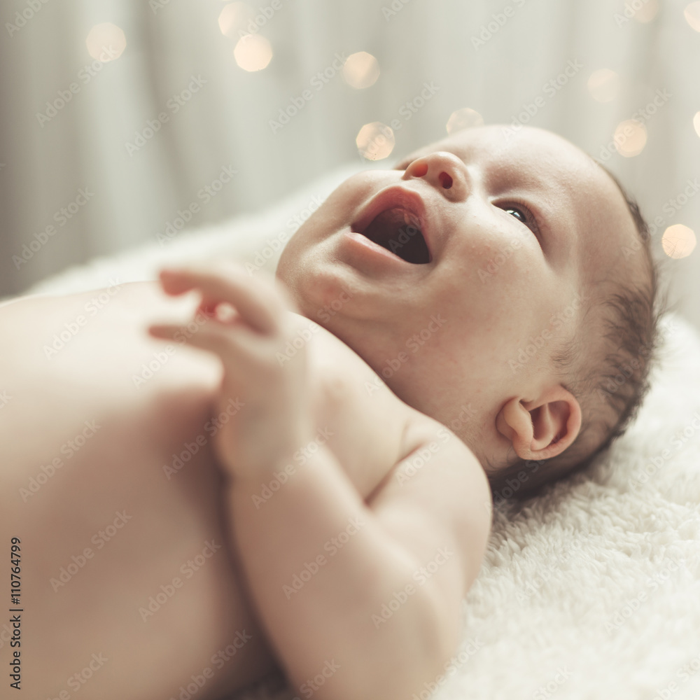 Newborn smiling widely Stock Photo | Adobe Stock