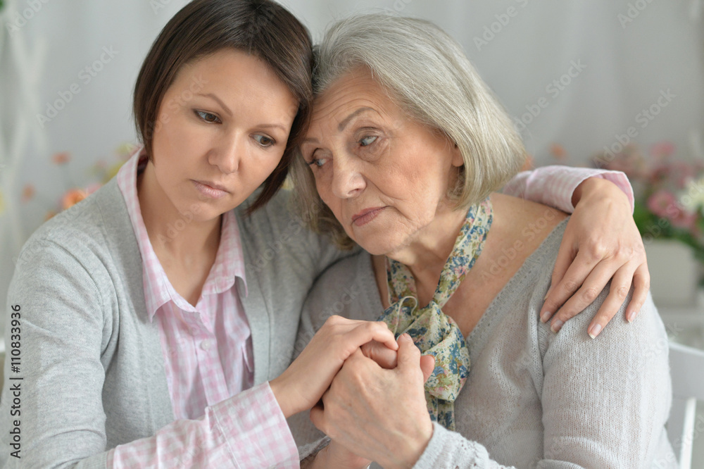 miserable mother and adult daughter Stock Photo | Adobe Stock