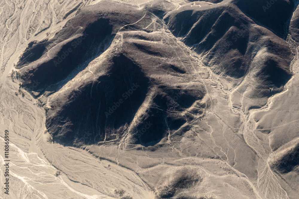 Aerial view of geoglyphs near Nazca - famous Nazca Lines, Peru. On the ...