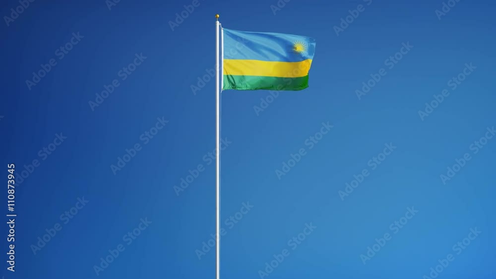 Rwanda flag waving in slow motion against clean blue sky, seamlessly ...