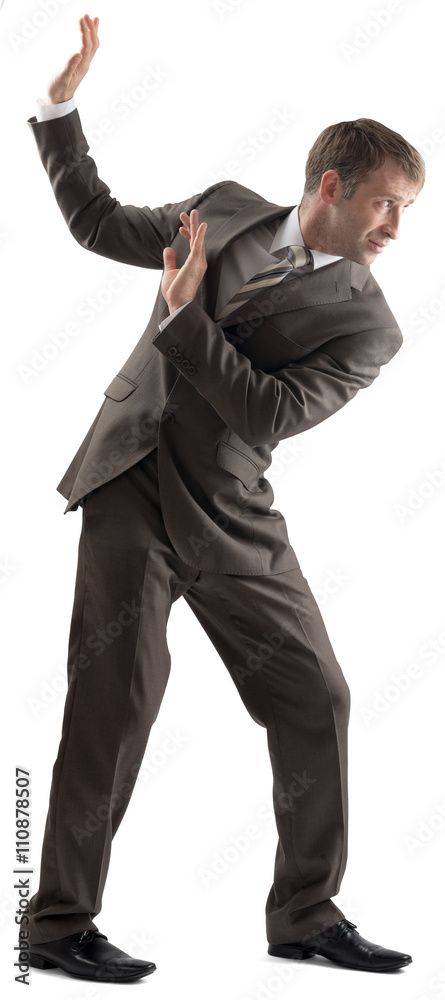 Shocked businessman protecting himself Stock Photo | Adobe Stock Shocked businessman protecting himself Stock Photo | Adobe Stock