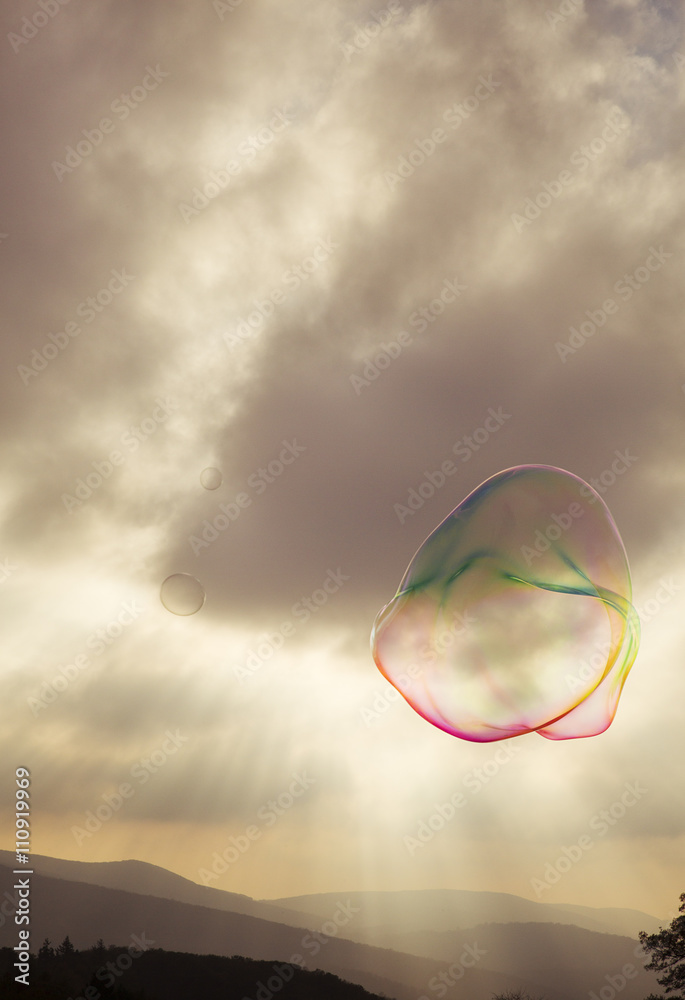 Big bubble floating in mid air Stock Photo | Adobe Stock