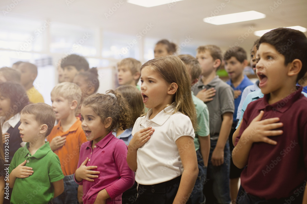 Children reciting Pledge of Allegiance in school Stock Photo | Adobe Stock