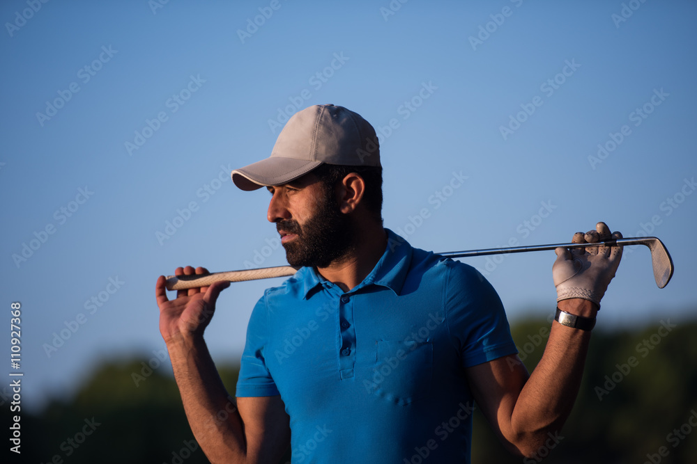 golfer portrait at golf course on sunset Stock Photo | Adobe Stock