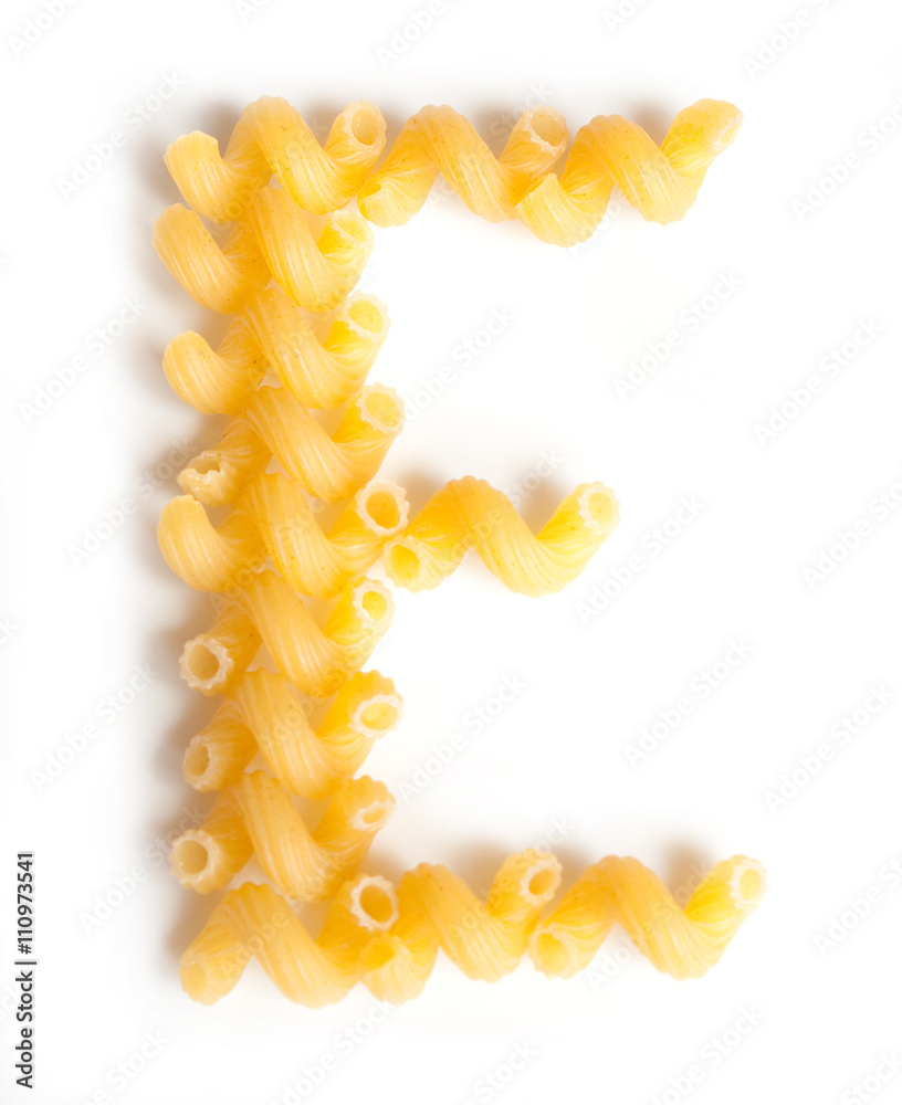Letter E made from macaroni under a daylight isolated on white ...