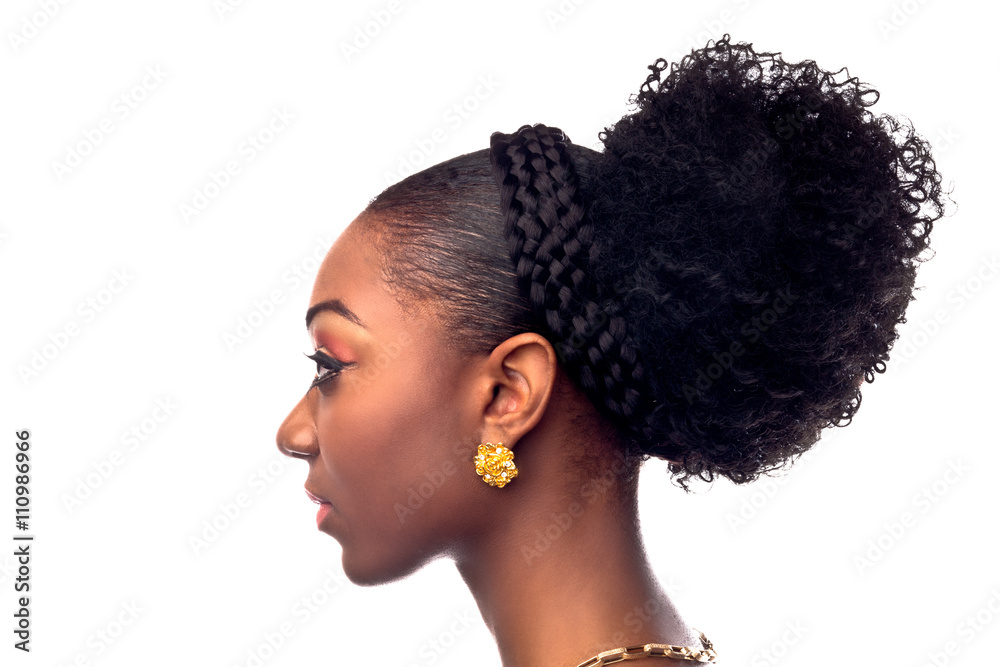 profile view of a attractive female with hair bun and braids. Stock ...