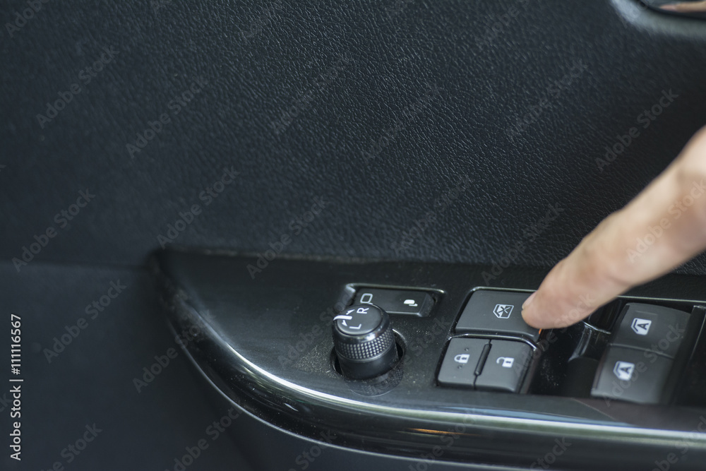 Press the button to turn on or off the glass. Stock Photo | Adobe Stock