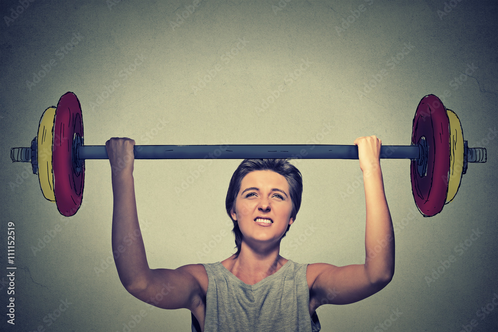 Strong woman lifting heavy barbell. Determination task completion hard ...