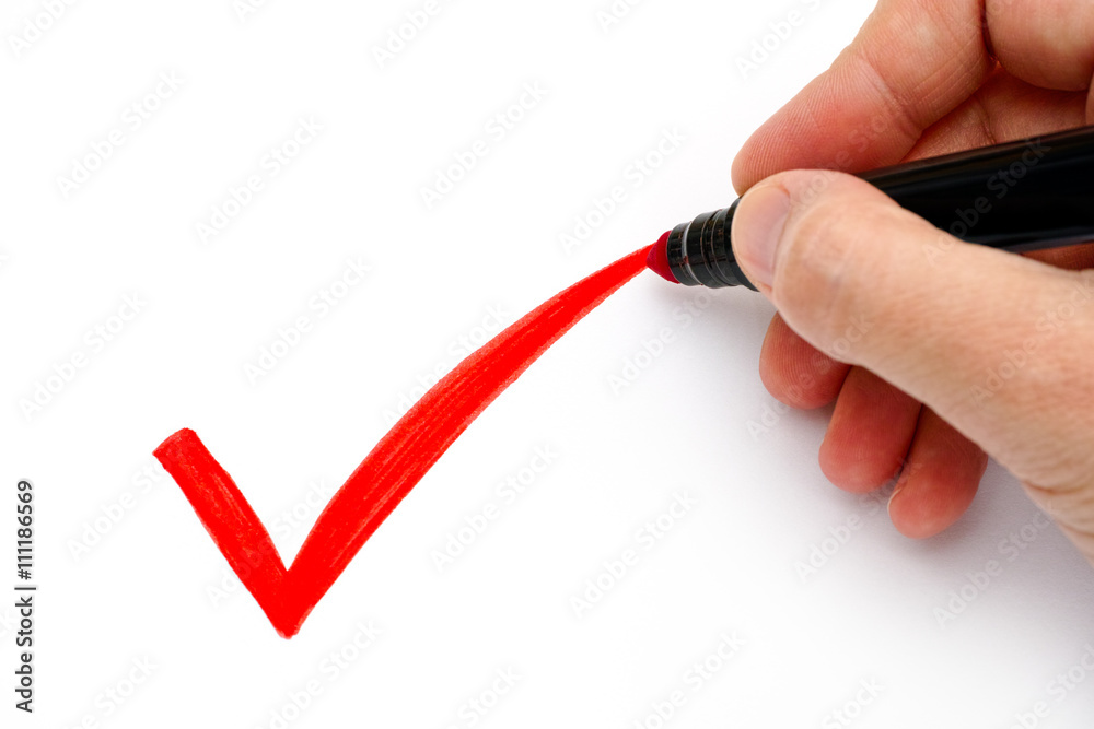 Woman hand with marker drawing red check mark Stock Photo | Adobe Stock