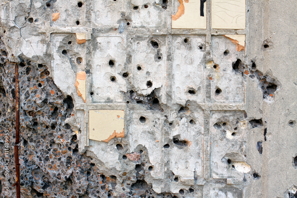 wall shattered with bullets Stock Photo | Adobe Stock