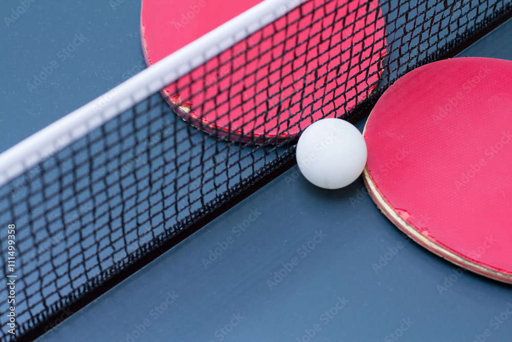 Ping Pong: composition of two old scratched rackets with grid and ball ...