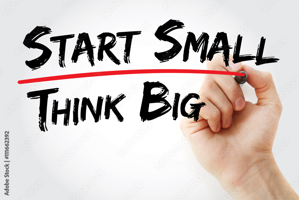 Hand writing Start small think big with red marker, business concept ...