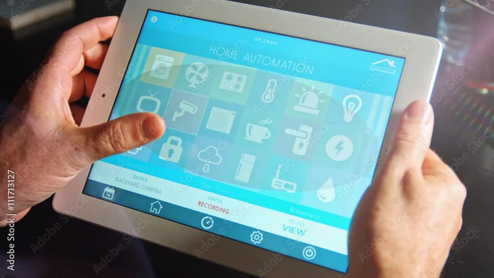 smart house, smart home automation, device with app icons. Man uses his ...