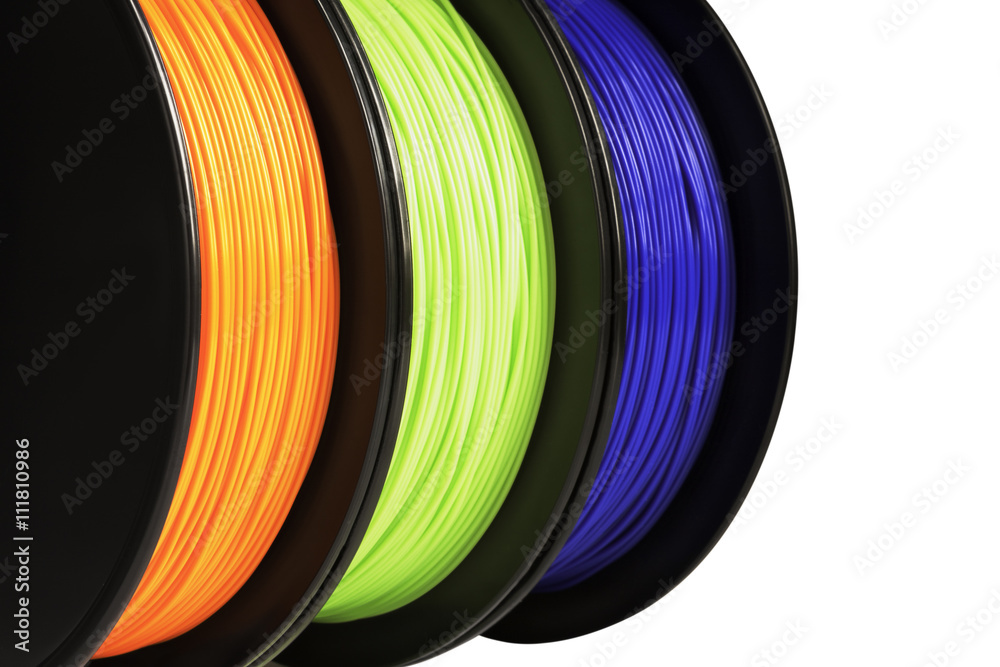Filament for 3d printing. Bright termoplastic of neon orange, green and ...