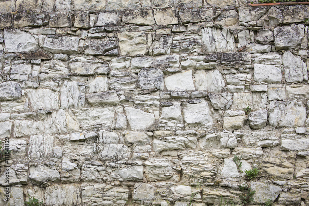 Stone old wall texture. Old rock blocks in old medieval brick. Exterior ...