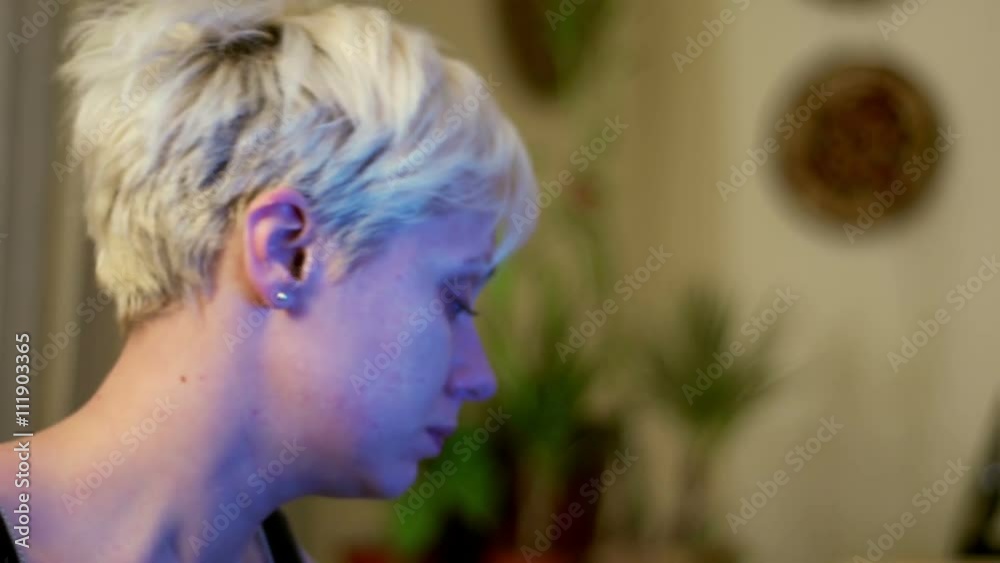 Young, Blond Haired Woman Removing Her Bra vídeo do Stock | Adobe Stock