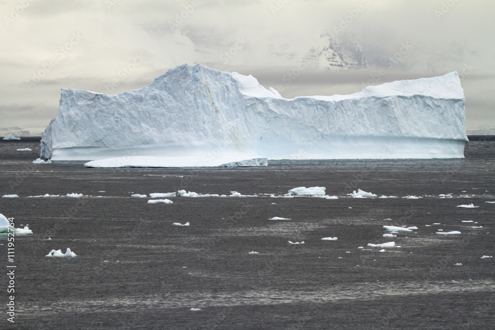 Antarctica - Non-Tabular Iceberg Floating In The Southern Ocean - Dry ...